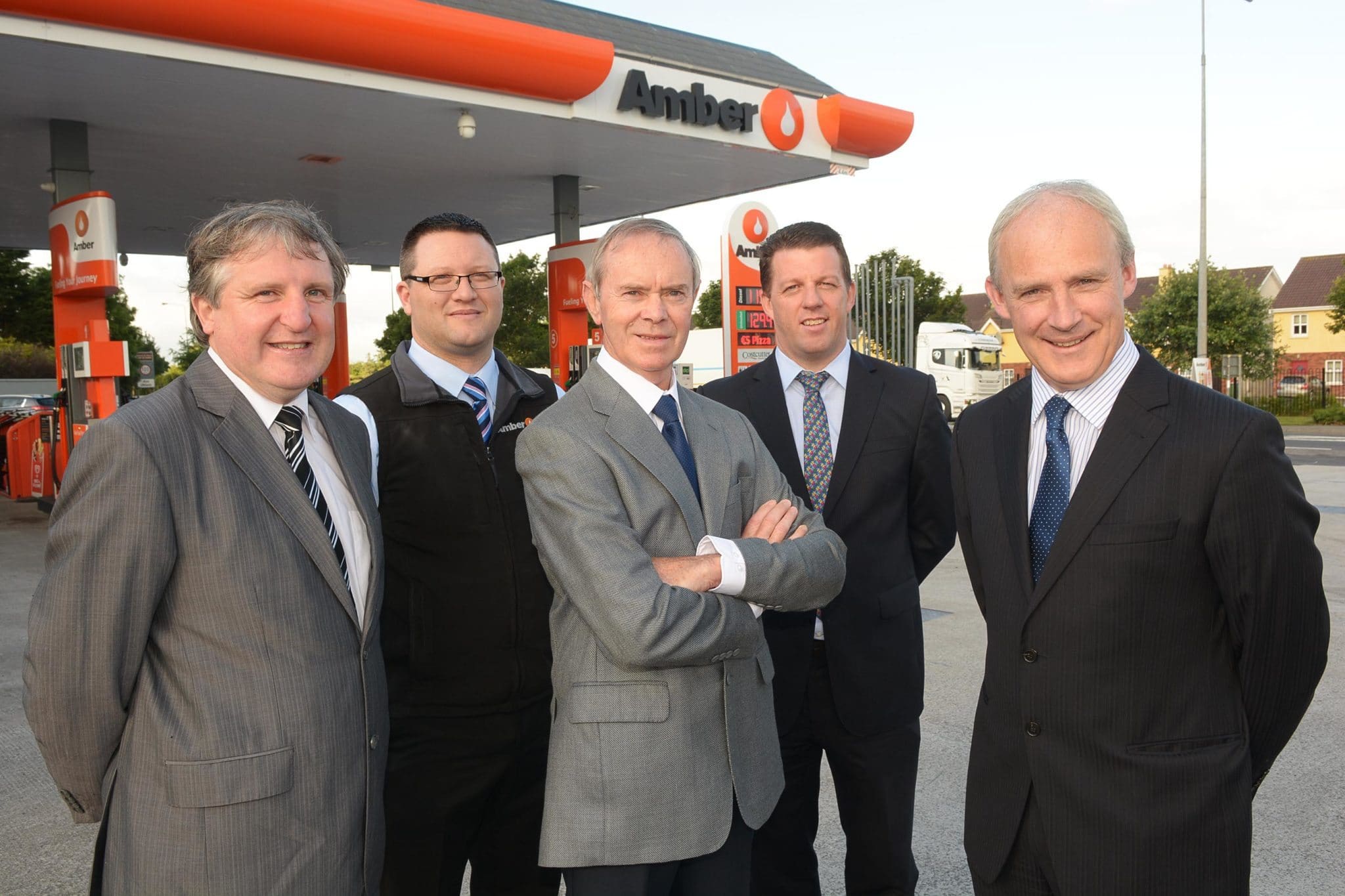 Store manager Wesley Walsh (2nd left) with Amber's Kevin Rice, Liam ...